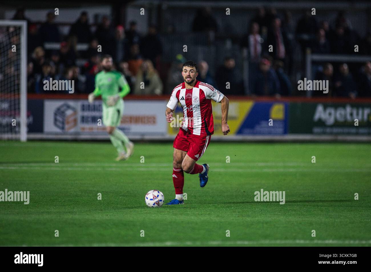 Brackley, UK. 14th Oct, 2025. Kyle Morrison (5 Brackley Town) running ...