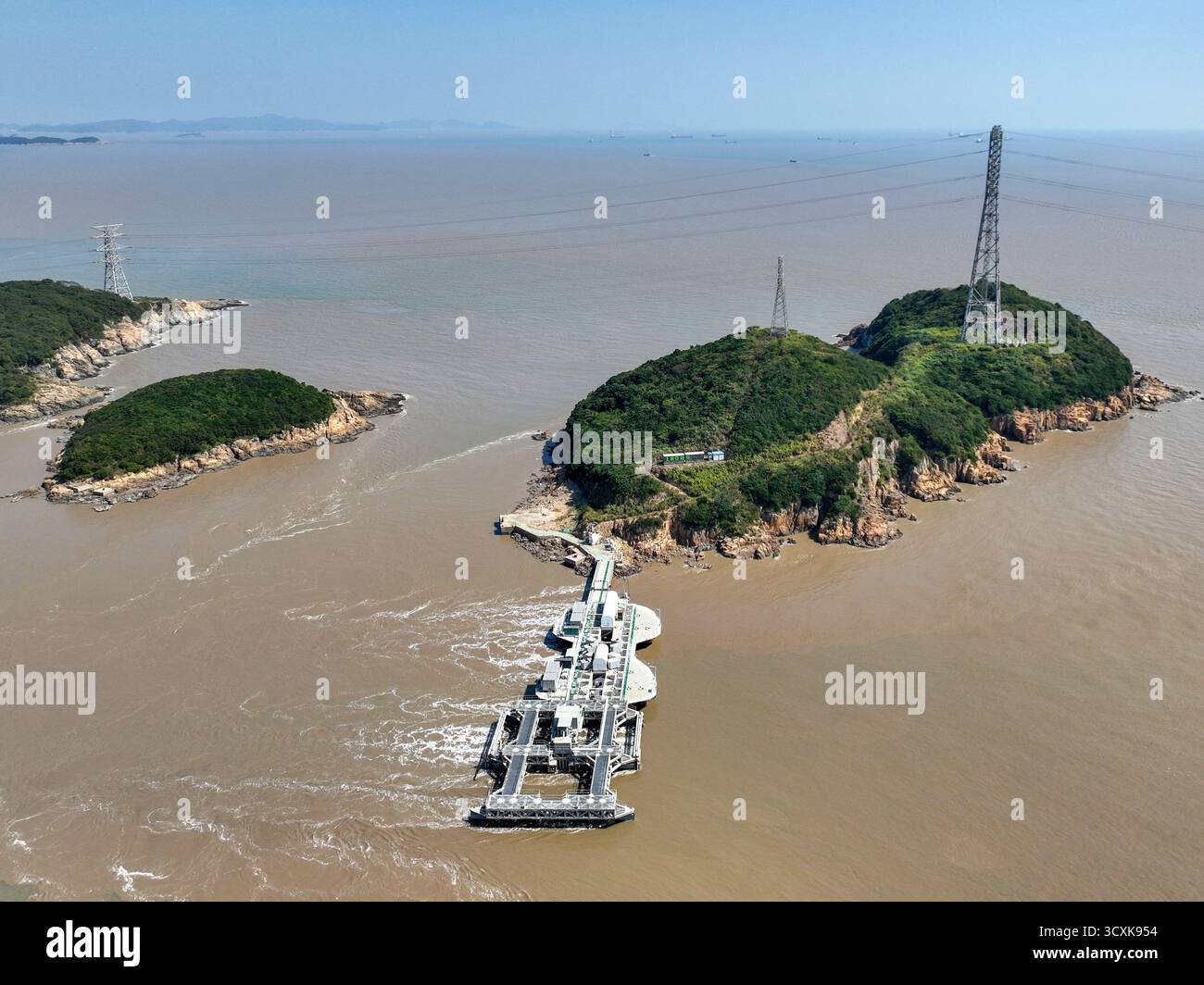Aerial view of the LHD Zhoushan tidal current power station next to ...