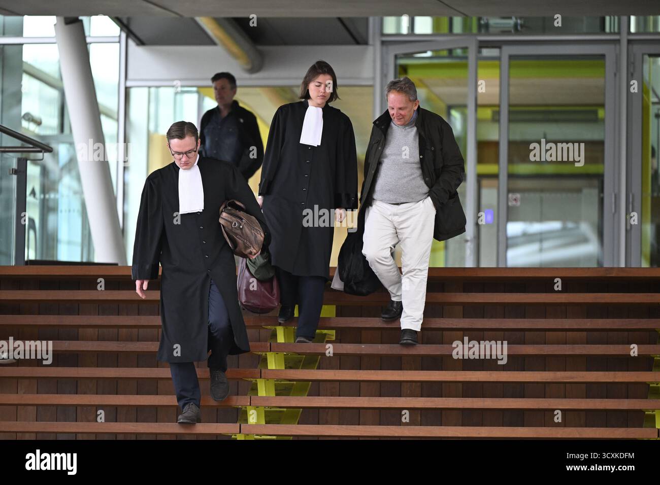 Lawyer Johan Platteau (R) leaves after a session of Antwerp Council ...