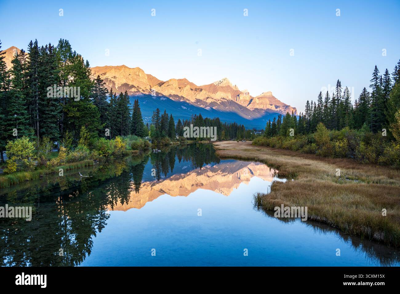 Early morning surise along Bow River Trail, Canadian Rocky Mountains ...