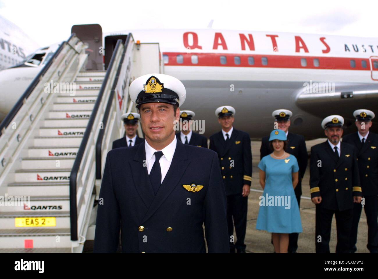 John Travolta arrives at Heathrow Airport for the UK leg of the Qantas ...