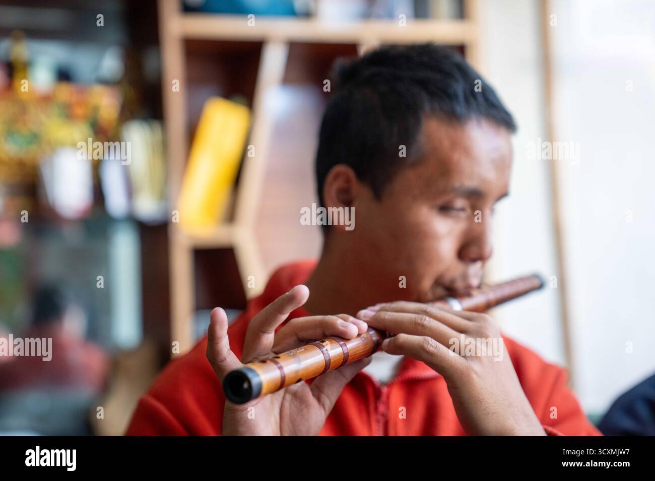 (251015) -- LHASA, Oct. 15, 2025 (Xinhua) -- Tawa Tsering plays flute ...