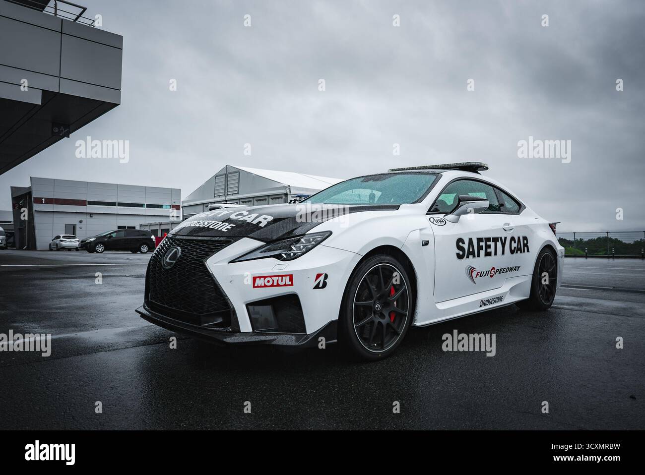 White Lexus RC F Safety Car on wet pit apron at Fuji Speedway Stock ...