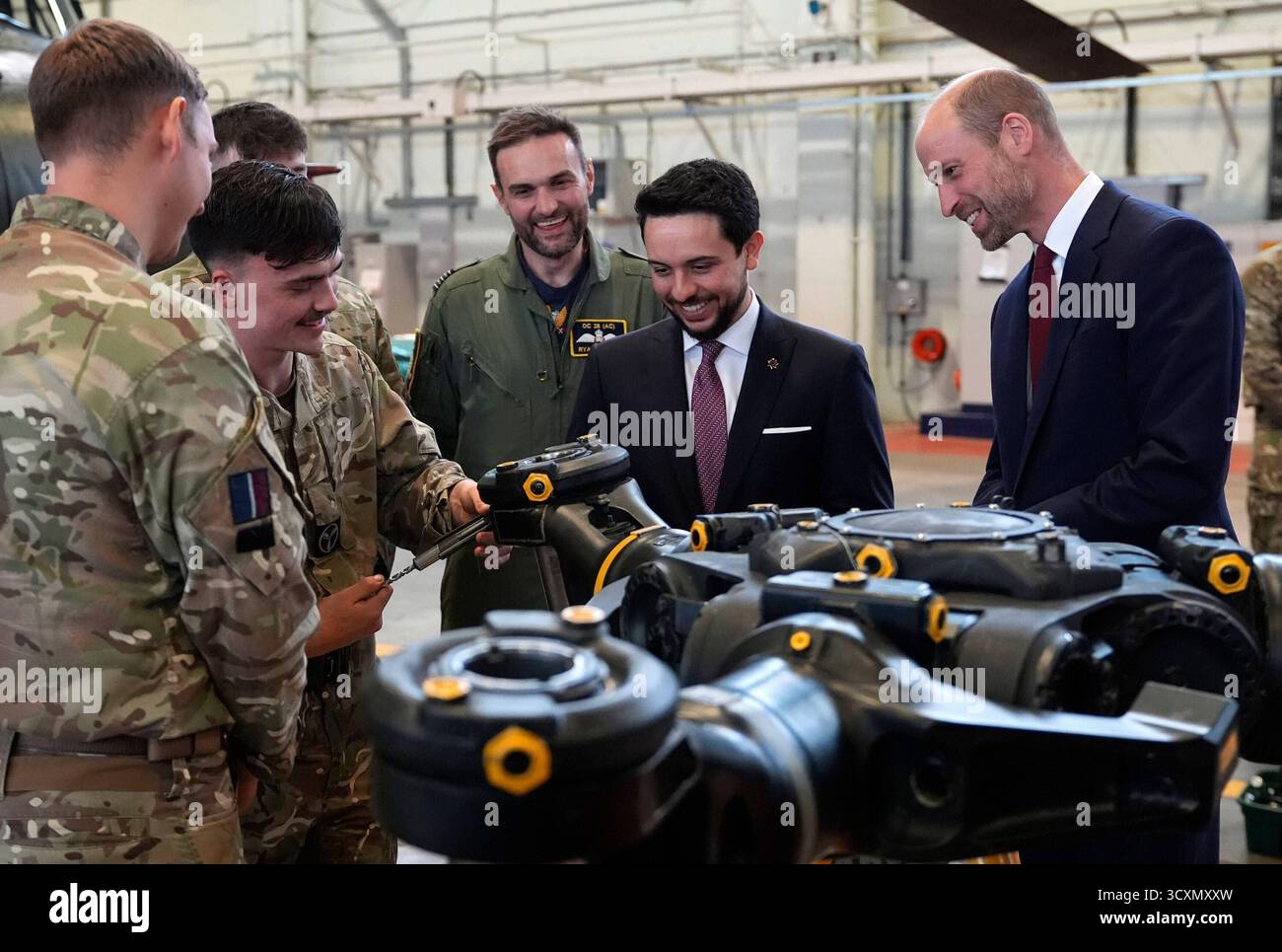 Britain's Prince William, right, and Jordan's Prince Hussein meet ...