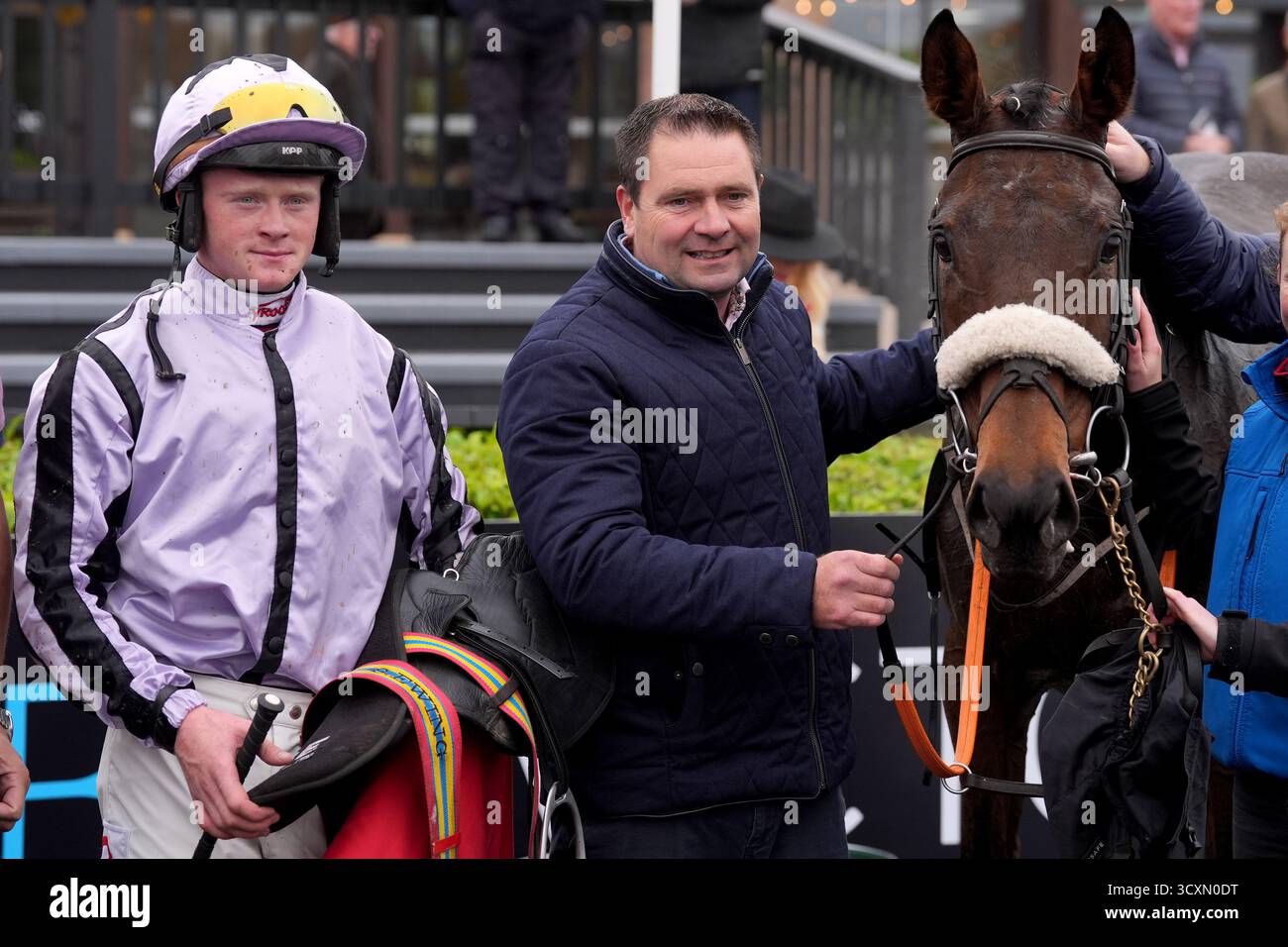 A Law Of Her Own ridden by Sam Ewing and trainer Peter Fahey (centre ...