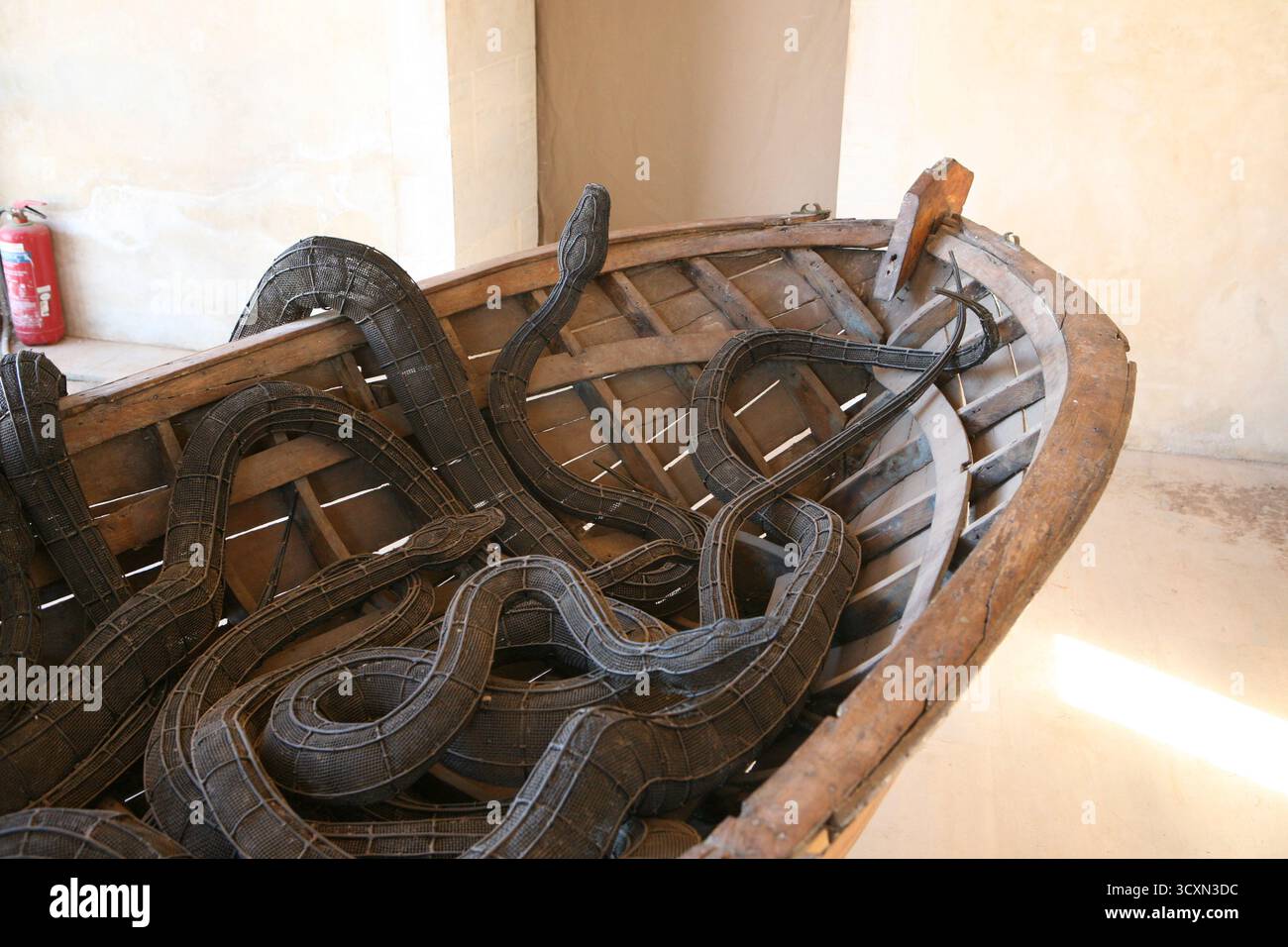 Wooden boat with seven snakes hi-res stock photography and images - Alamy