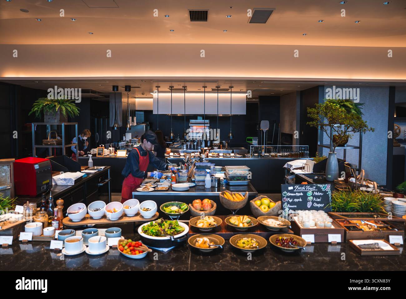 Modern hotel buffet with chef and assorted dishes in Japan Stock Photo ...