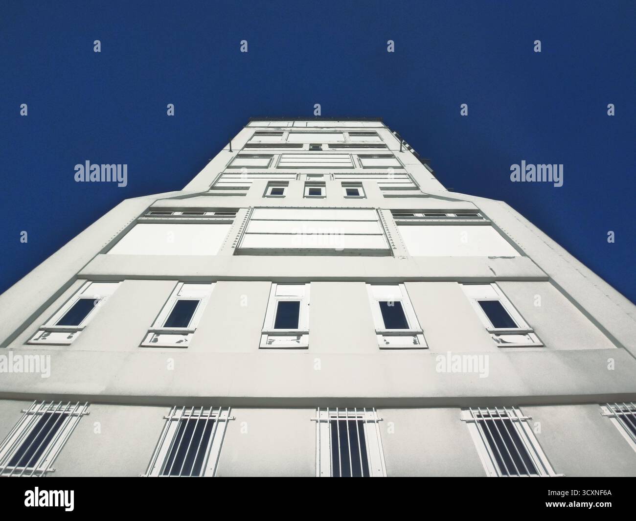 Modern White Building Viewed from Below against Blue Sky Stock Photo ...