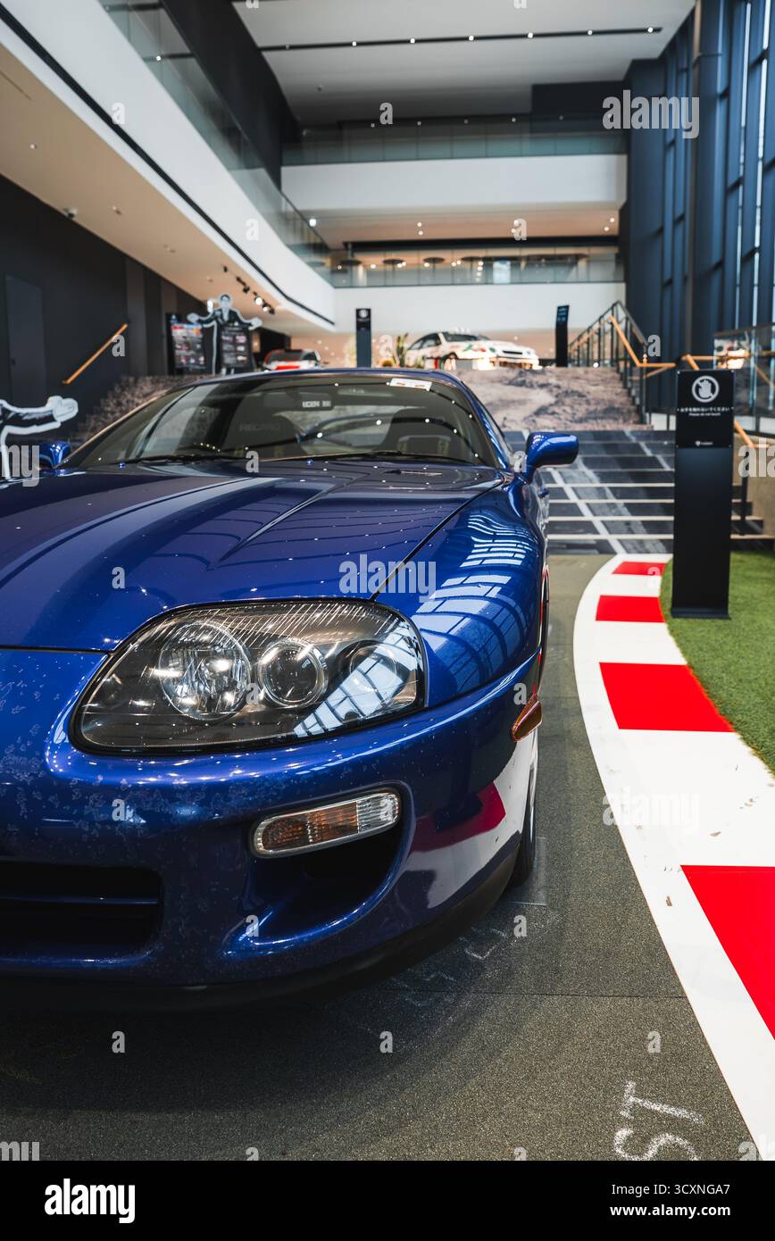 Blue Toyota Supra on mock racetrack inside Toyota car museum Japan ...