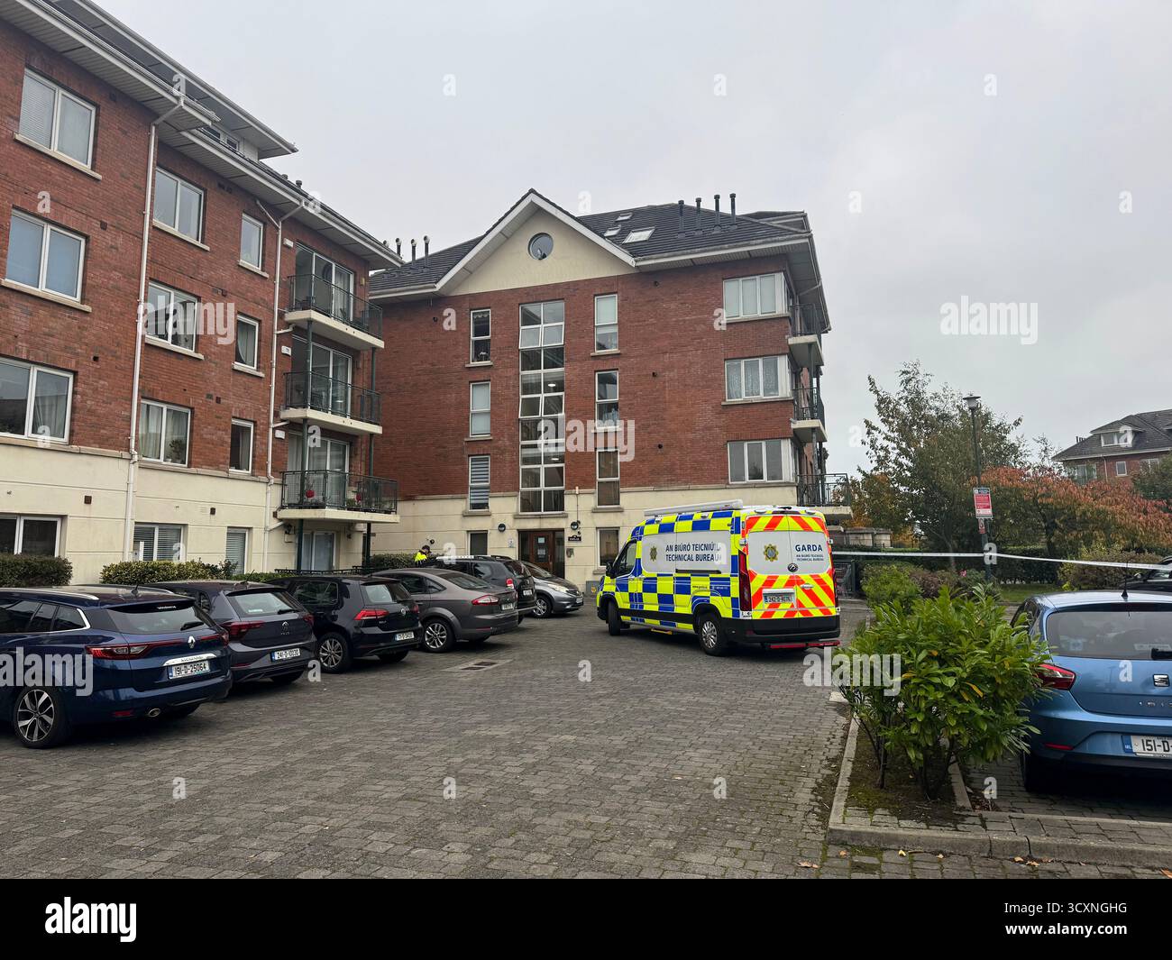 A vehicle from the Garda Technical Bureau is visible behind a crime ...