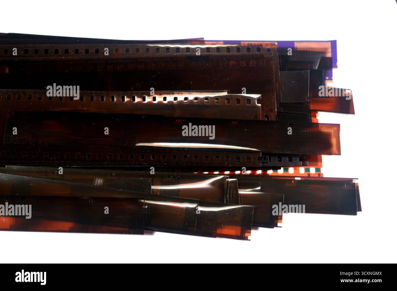 a stack of photographic film strips, typically 35mm film that was a ...