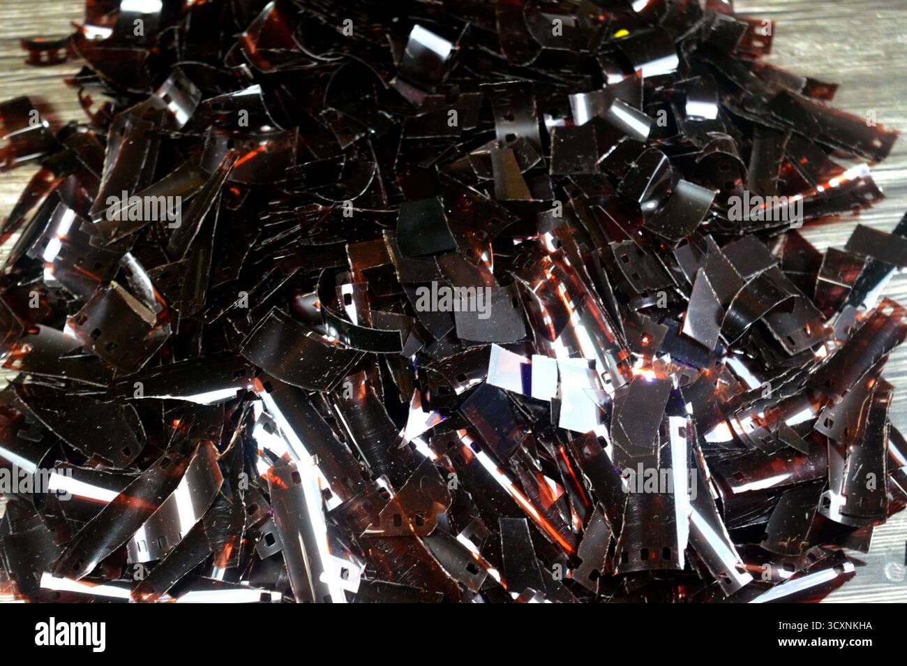pile of chopped shredded film strips, developed film negatives ...