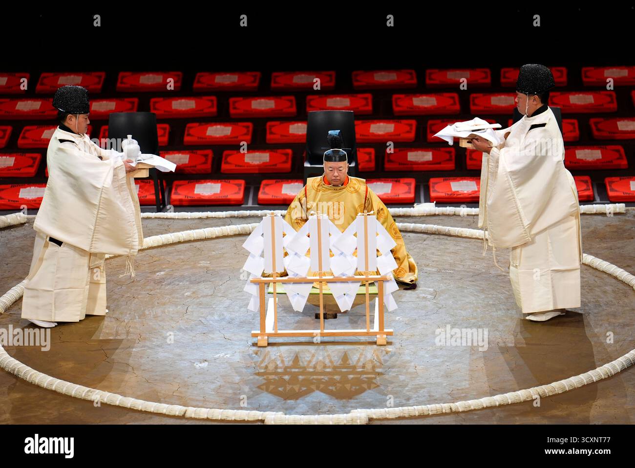 Gyoji perform the blessing of the sumo ring on day one of the Grand ...