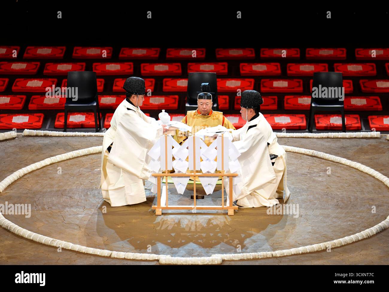 Gyoji perform the blessing of the sumo ring on day one of the Grand ...