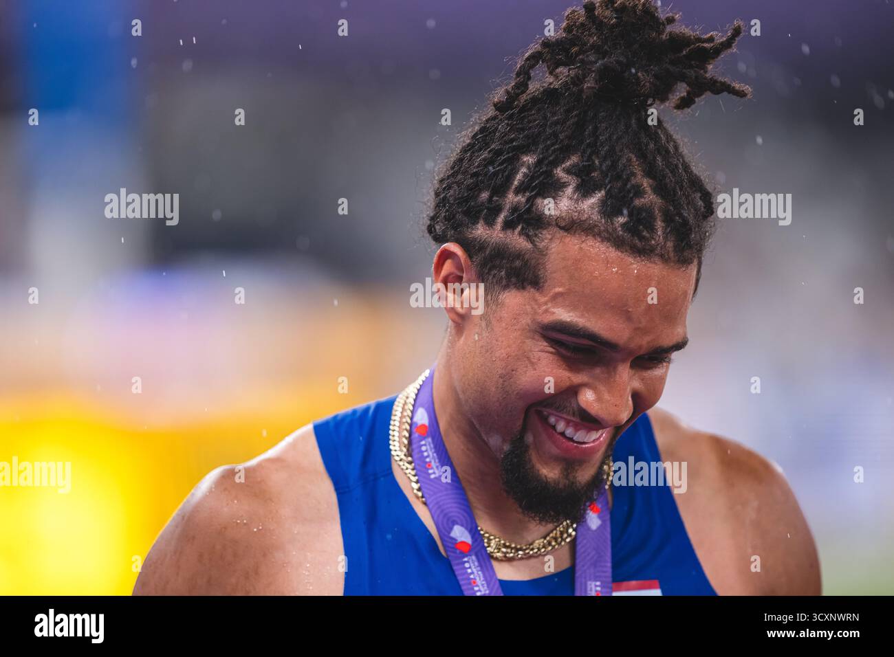 Ayden OWENS-DELERME celebrating her victory with her country's flag at ...