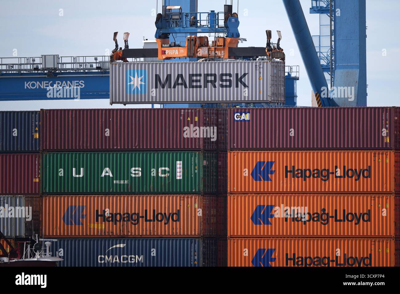 A ship is loaded with a container at the Port of Philadelphia Wednesday ...
