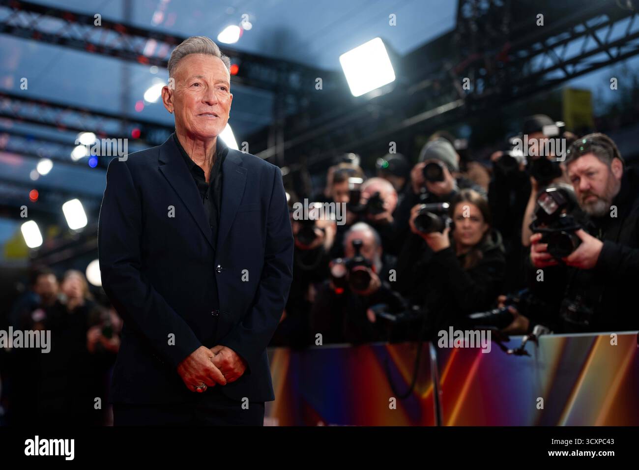 Bruce Springsteen poses for photographers upon arrival at the premiere ...