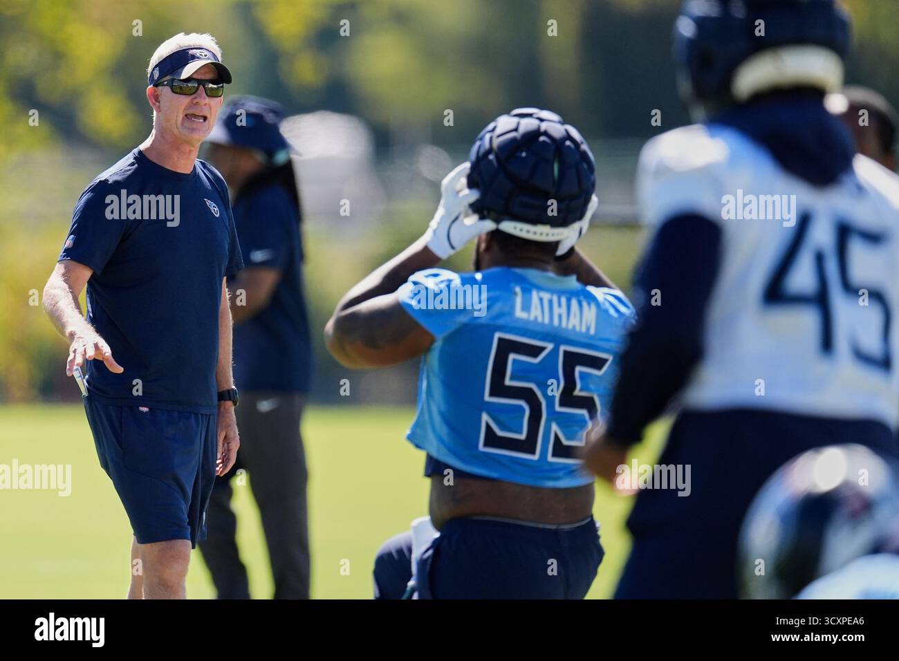 Tennessee Titans interim head coach Mike McCoy talks to his players ...