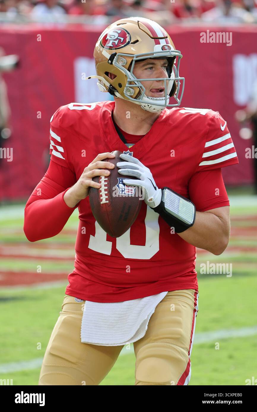 San Francisco 49ers quarterback Mac Jones (10) warms up before his game ...