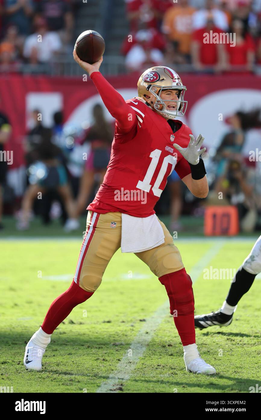 San Francisco 49ers quarterback Mac Jones (10) throws a pass against ...