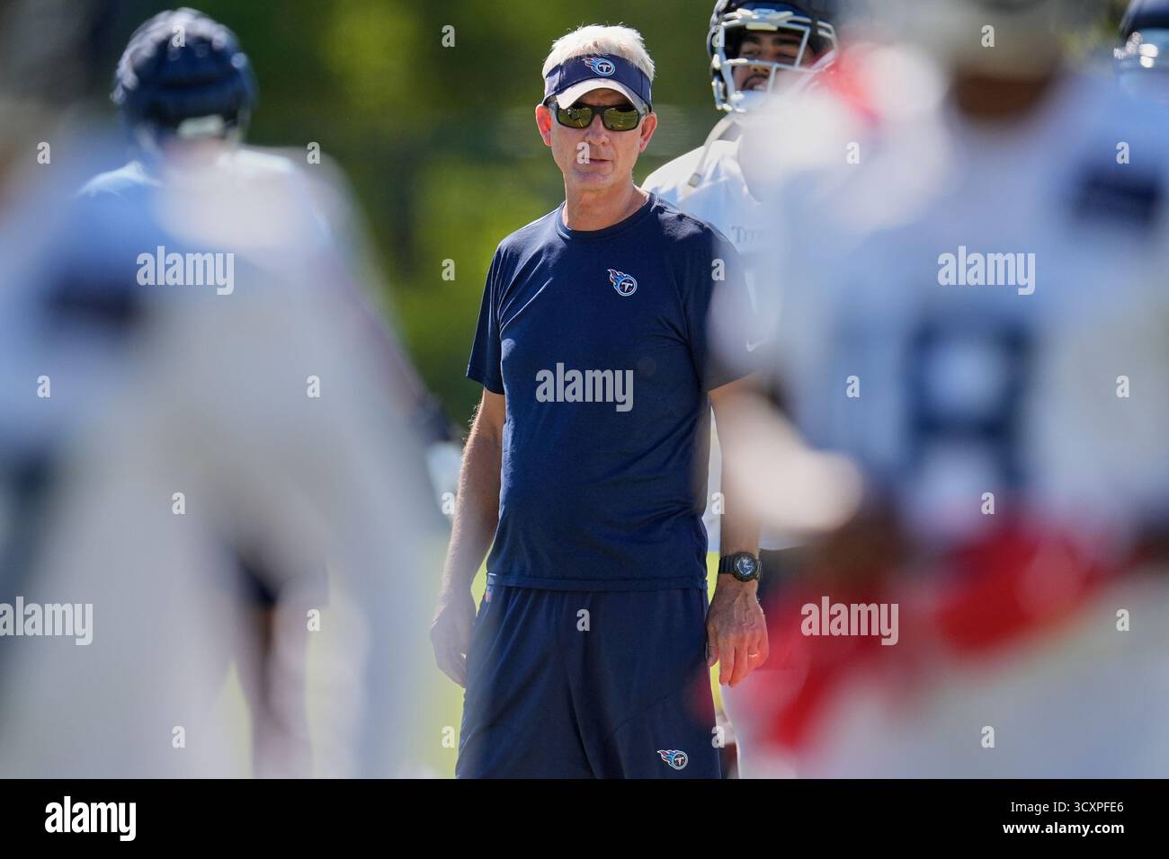 Tennessee Titans interim head coach Mike McCoy watches his players ...