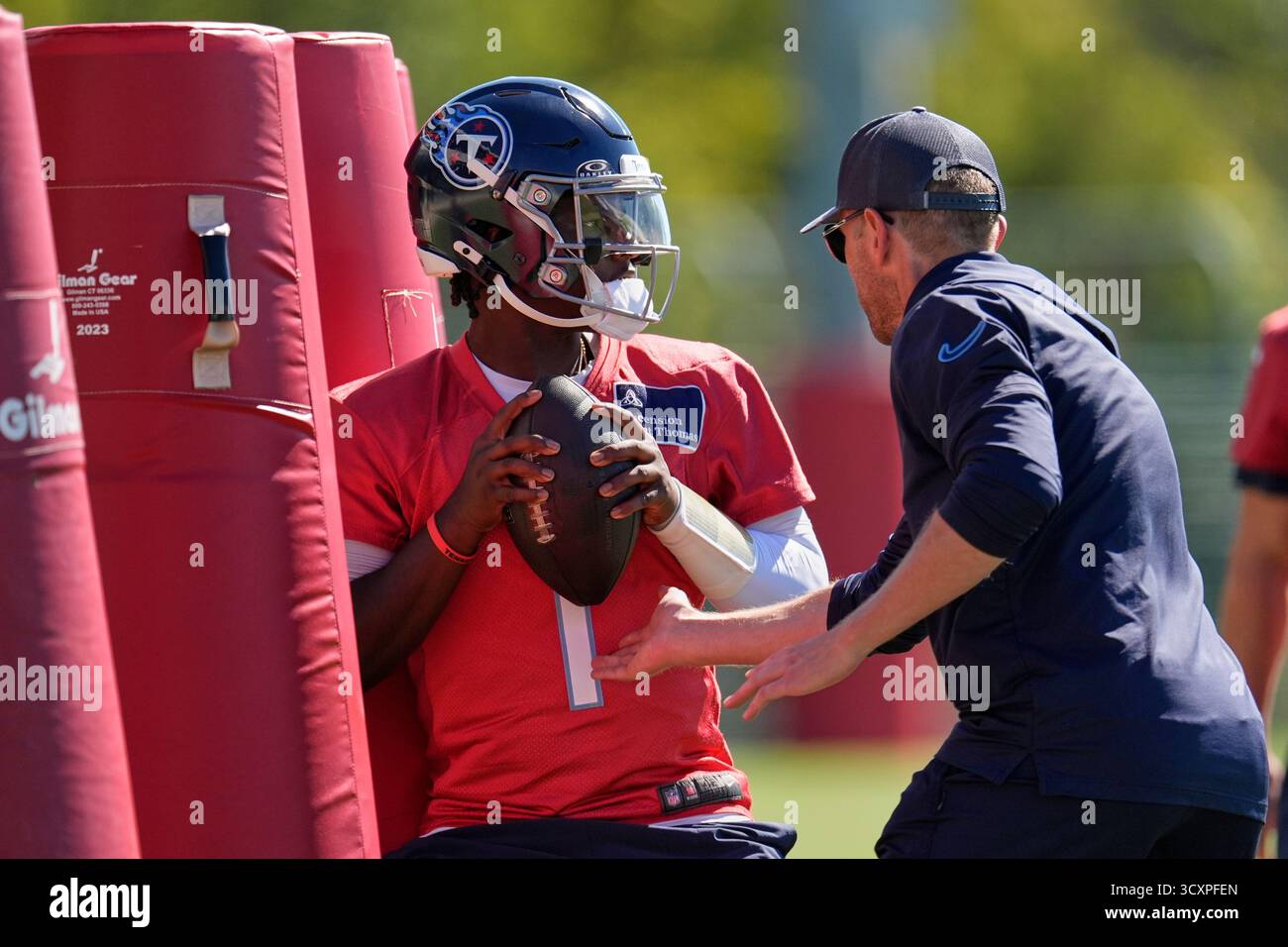 Tennessee Titans quarterback Cam Ward (1) runs a drill with ...