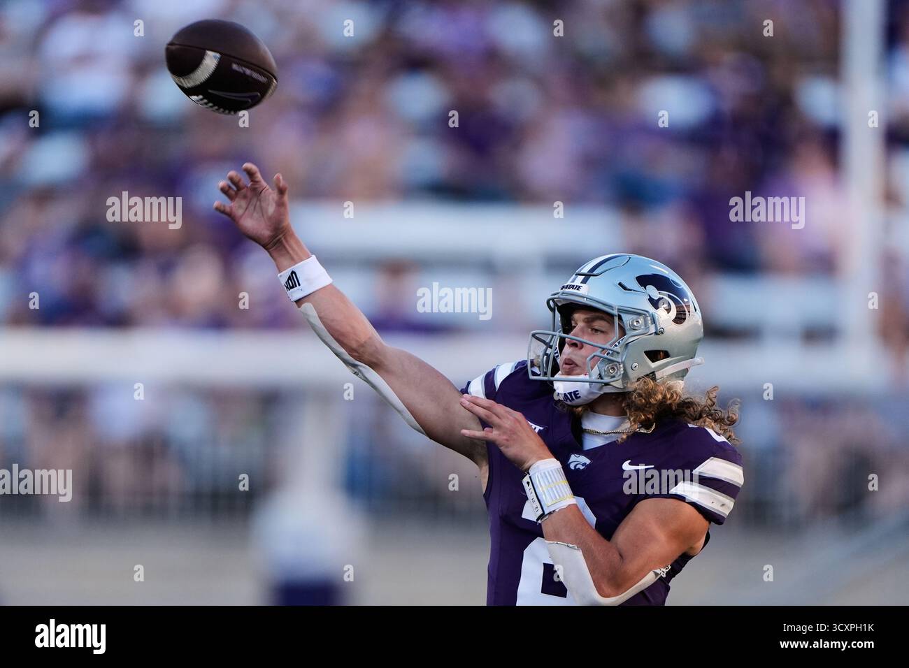Kansas State quarterback Avery Johnson passes during the first half of ...