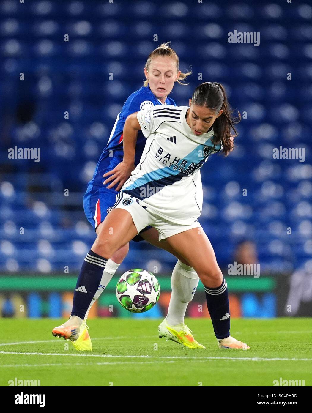 Chelsea's Keira Walsh (left) and Paris FC's Clara Mateo battle for the ...