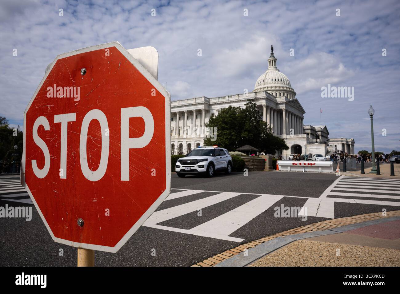 A stop sign is seen outside the U.S. Capitol building on the 15th day ...