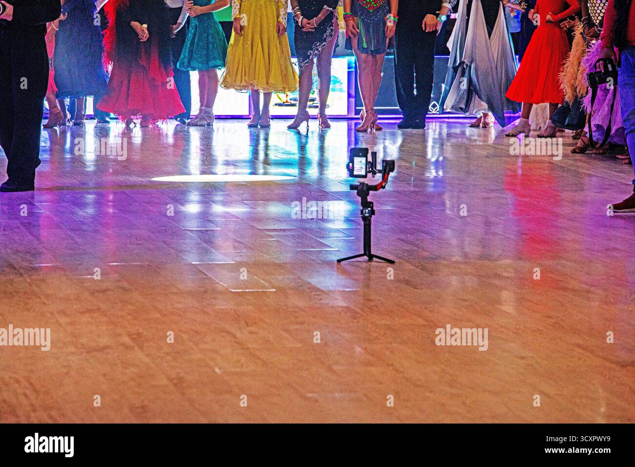 Filming the dance parade before the tournament in the middle of the ...