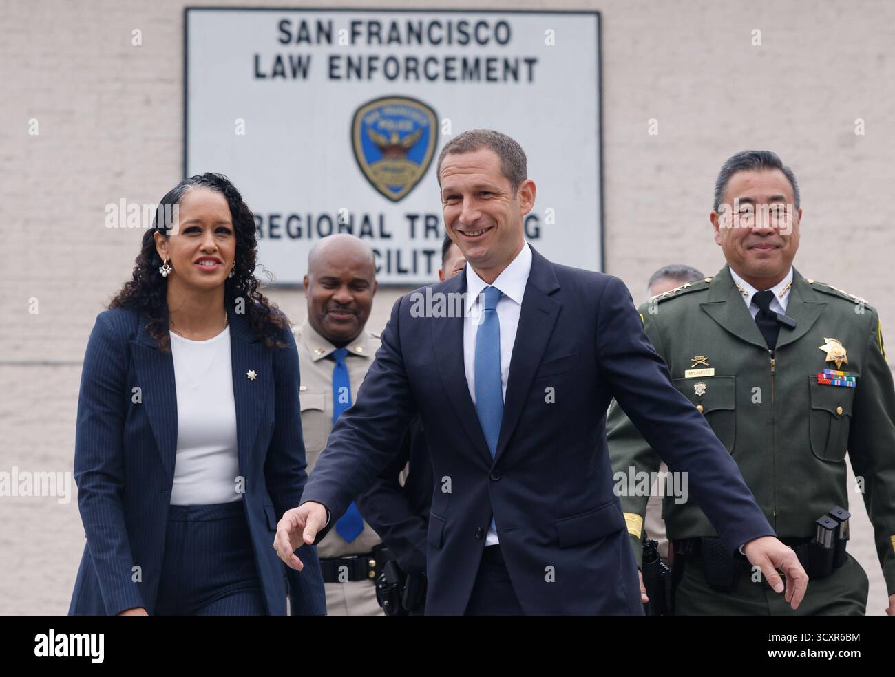 District Attorney Brooke Jenkins, front left to right, Mayor Daniel ...