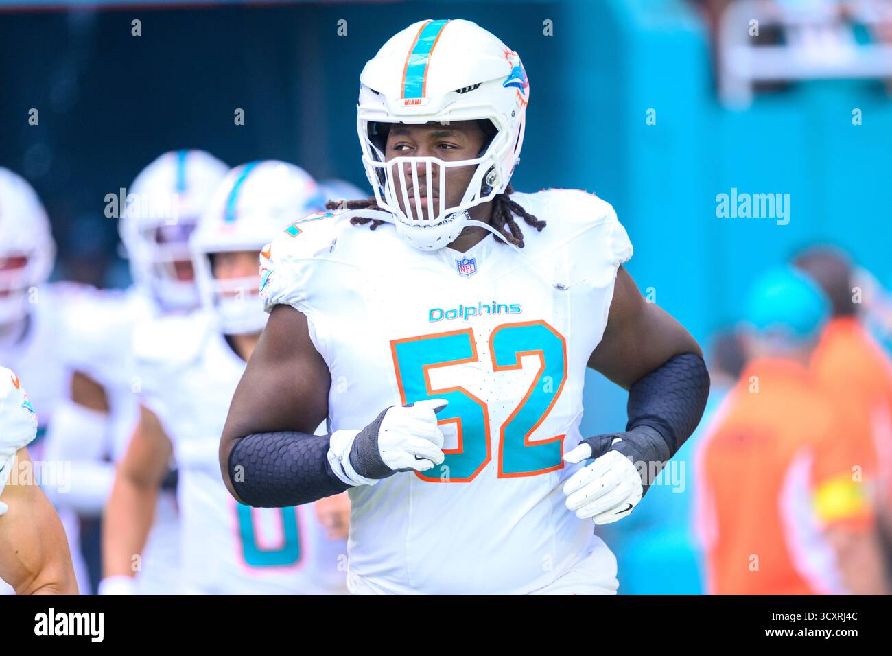 Miami Dolphins tackle Patrick Paul (52) runs onto the field during ...
