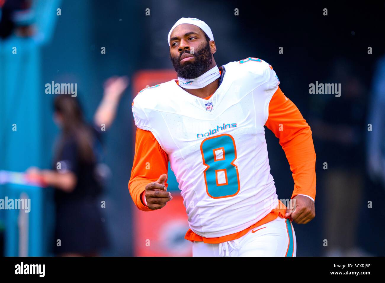 Miami Dolphins linebacker Matthew Judon (8) runs onto the field during ...