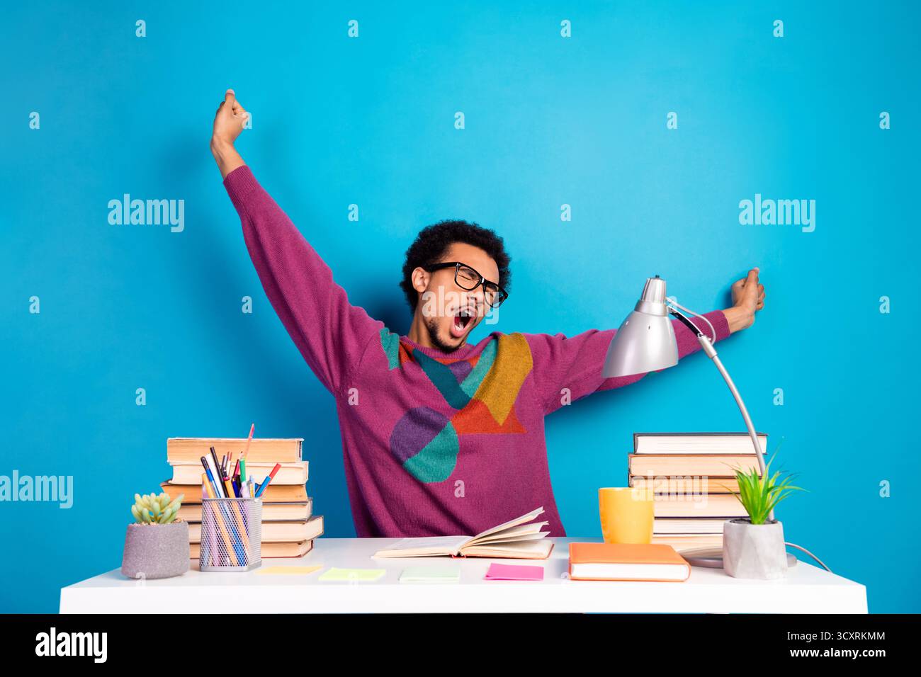 Funny man stretching desk hi-res stock photography and images - Alamy