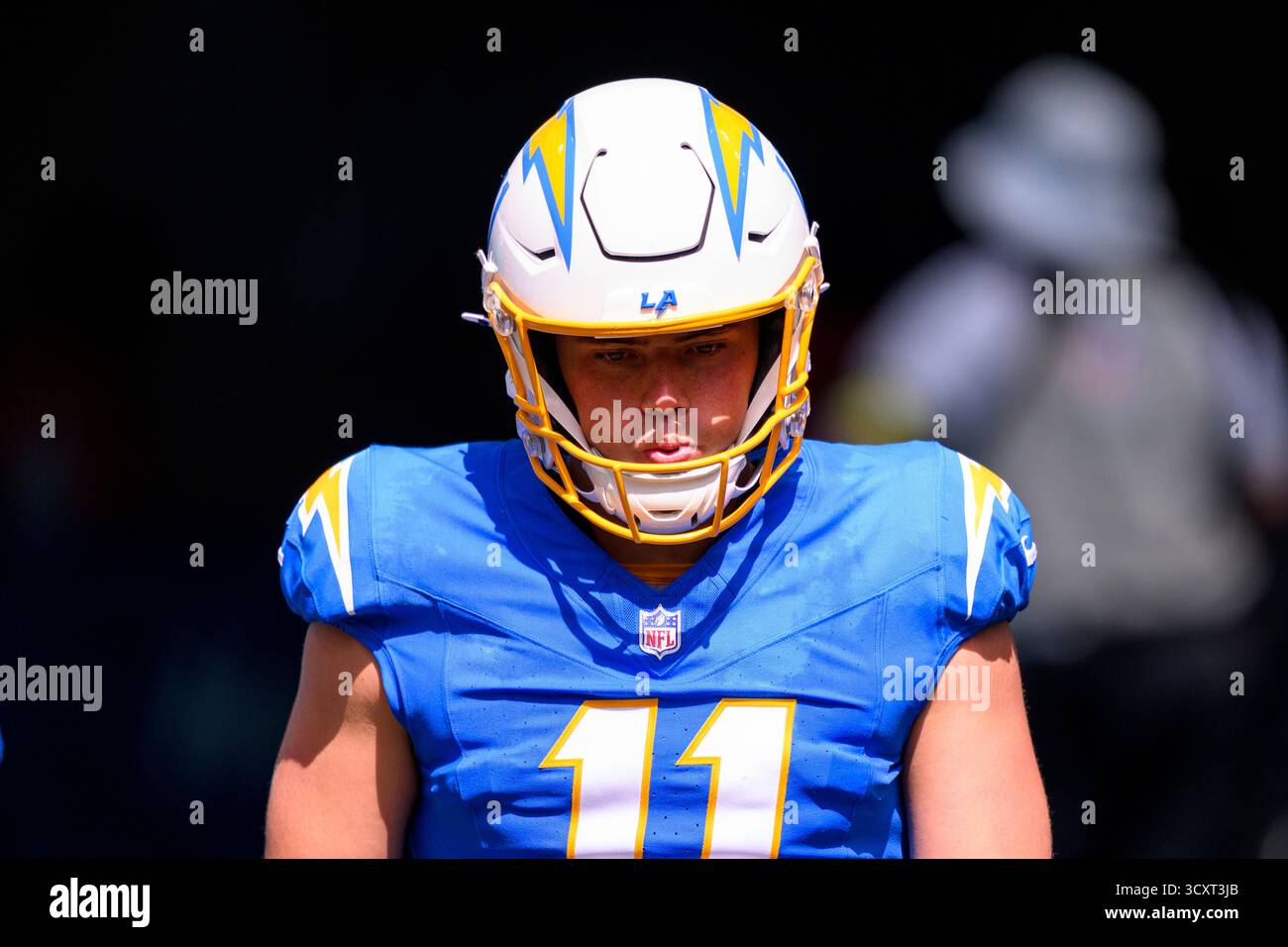 Los Angeles Chargers kicker Cameron Dicker (11) walks onto the field ...