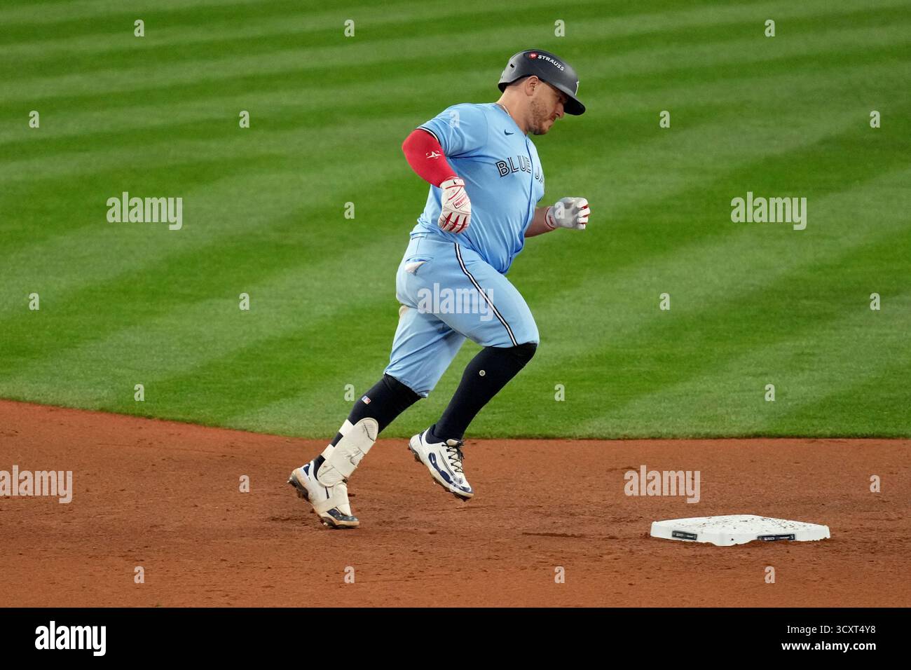 Toronto Blue Jays' Alejandro Kirk rounds the bases after hitting a ...