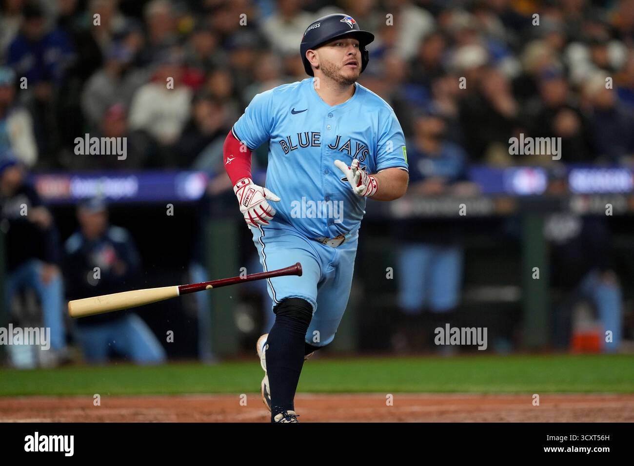 Toronto Blue Jays' Alejandro Kirk watches his three run home run ...