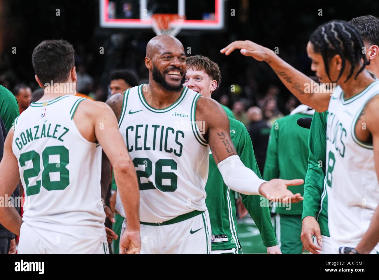 Boston Celtics forward Xavier Tillman (26) is congratulated by ...