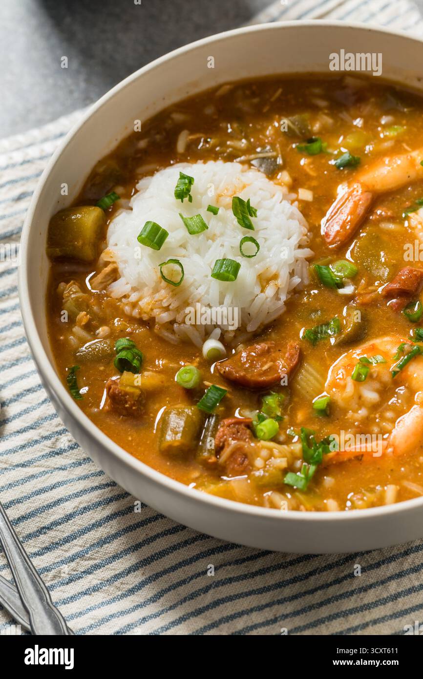 Savory Homemade Cajun Gumbo Stew with White Rice Stock Photo - Alamy