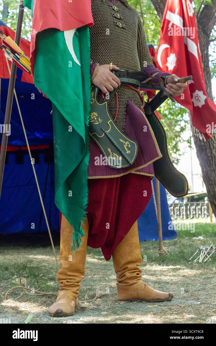 A reenactor in traditional ottoman turkish warrior costume with weapons ...