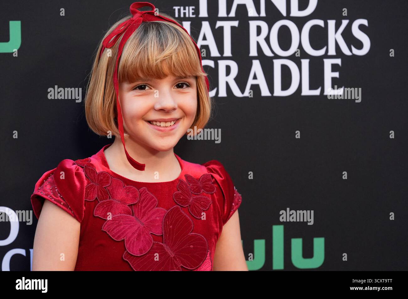 Arabella Oliva Clark arrives at the premiere of "The Hand That Rocks ...