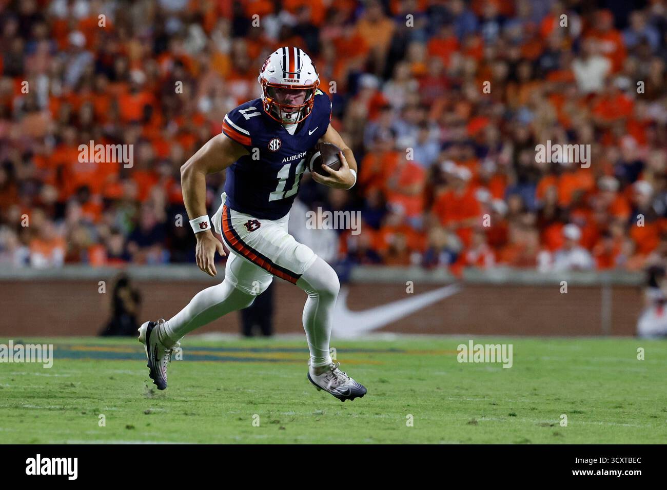 Auburn quarterback Jackson Arnold carries the ball against Georgia ...