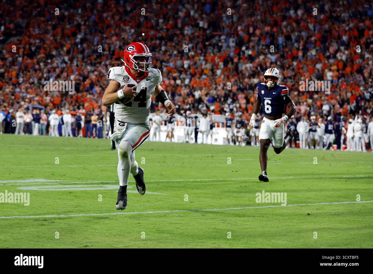 Georgia quarterback Gunner Stockton carries the ball in for a touchdown ...