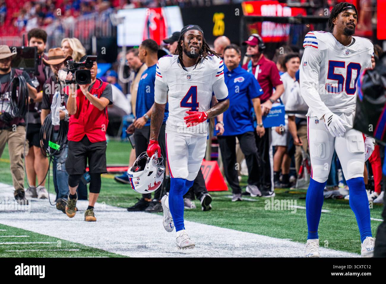 Buffalo Bills running back James Cook (4) walks off the field before an ...
