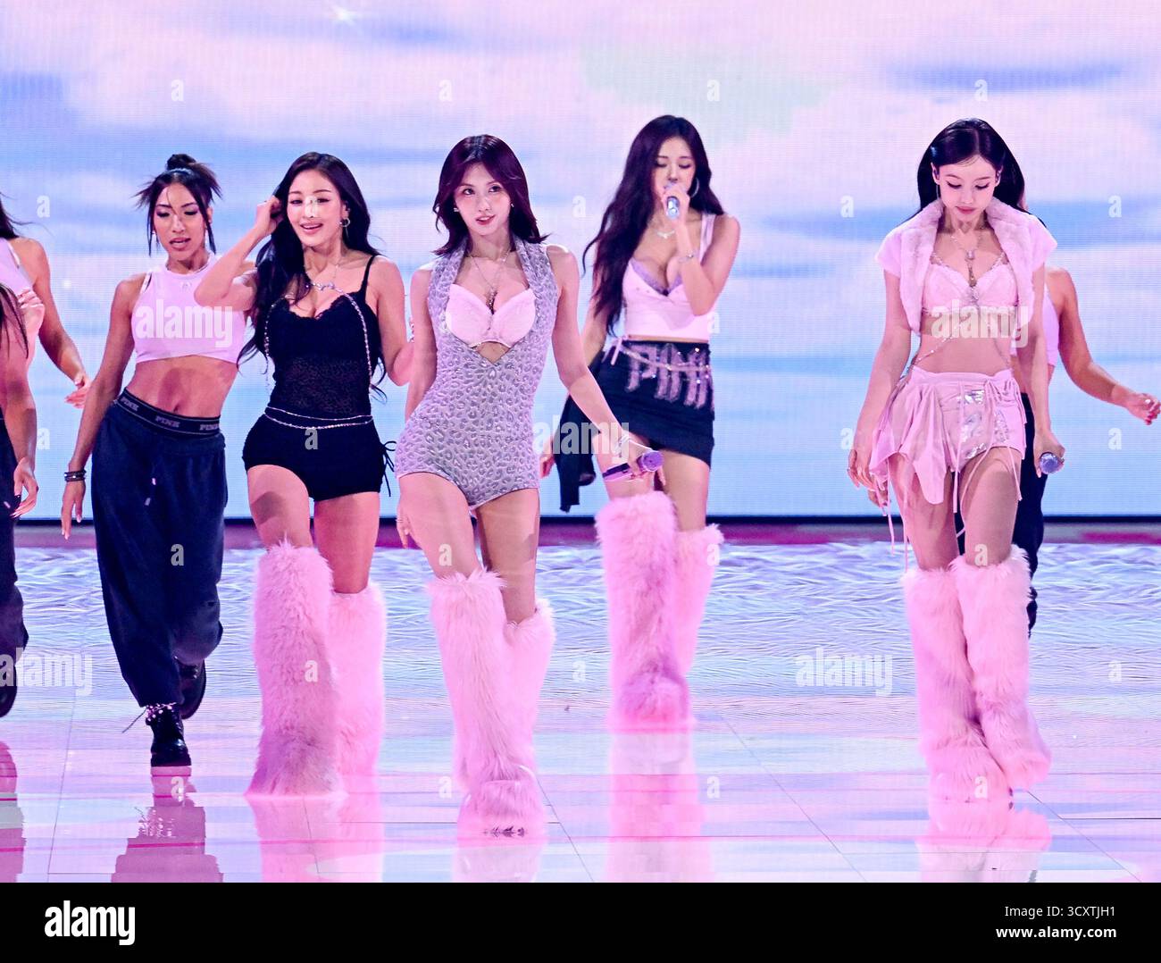 TWICE performs during the Victoria's Secret Fashion Show on Wednesday ...