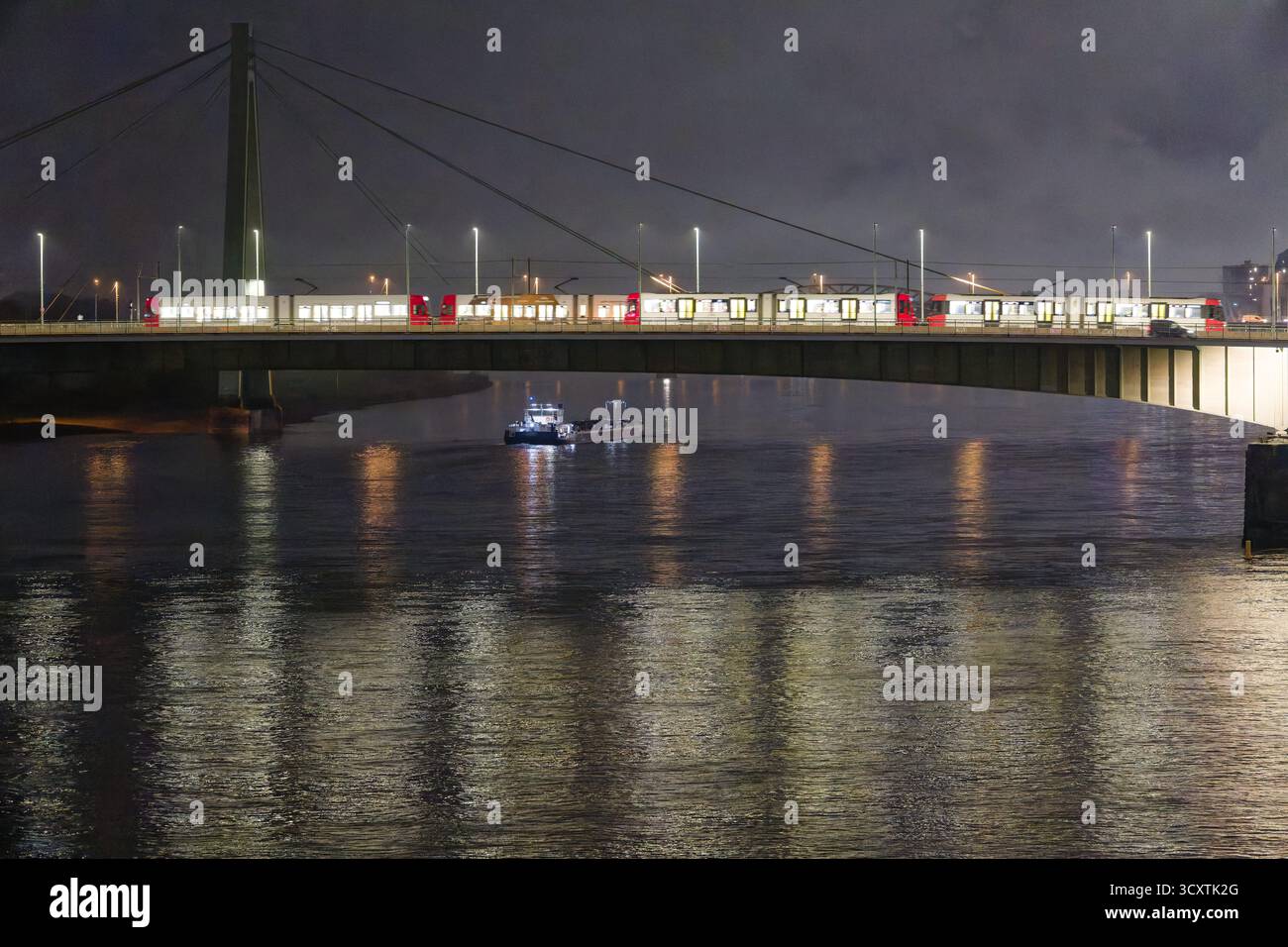 Cologne, Germany. 16th Oct, 2025. Light rail vehicles cross the Rhine ...