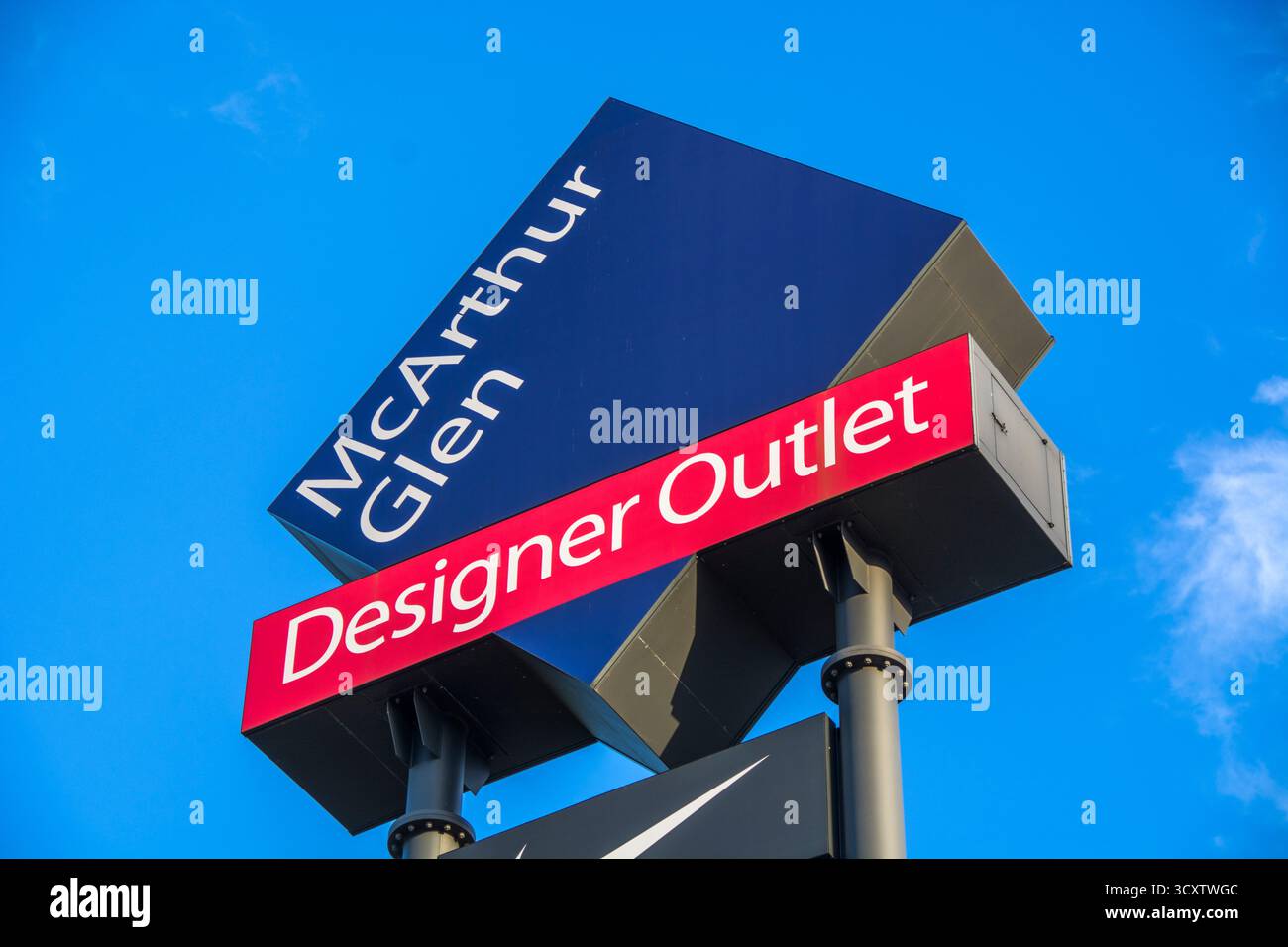 sign of McArthurGlen Designer Outlet West Midlands , in clear blue sky ...