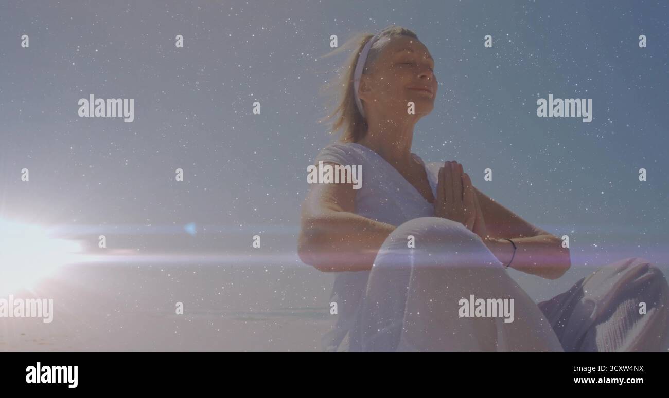 Meditating yogi holding hands hi-res stock photography and images - Alamy