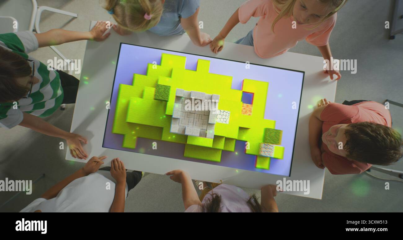 Children collaborating around interactive 3d hi-res stock photography ...