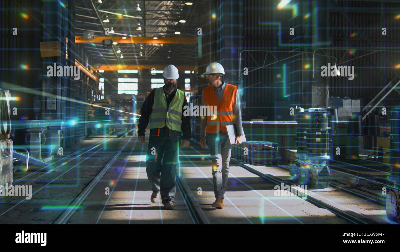 Two engineers in safety vests hi-res stock photography and images - Alamy